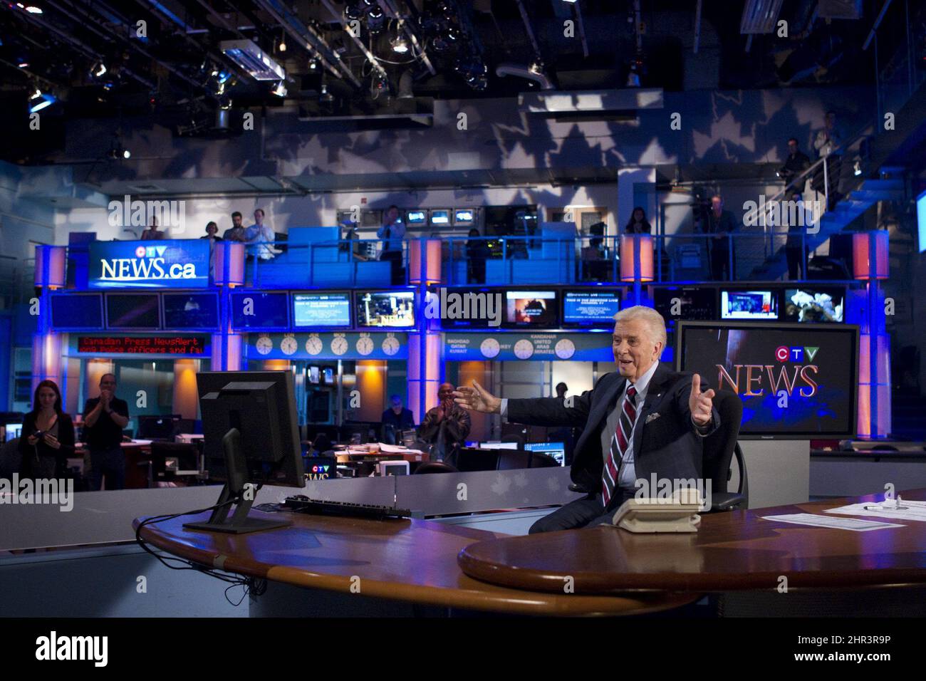 CTV news anchor Lloyd Robertson turns to welcome family members and ...