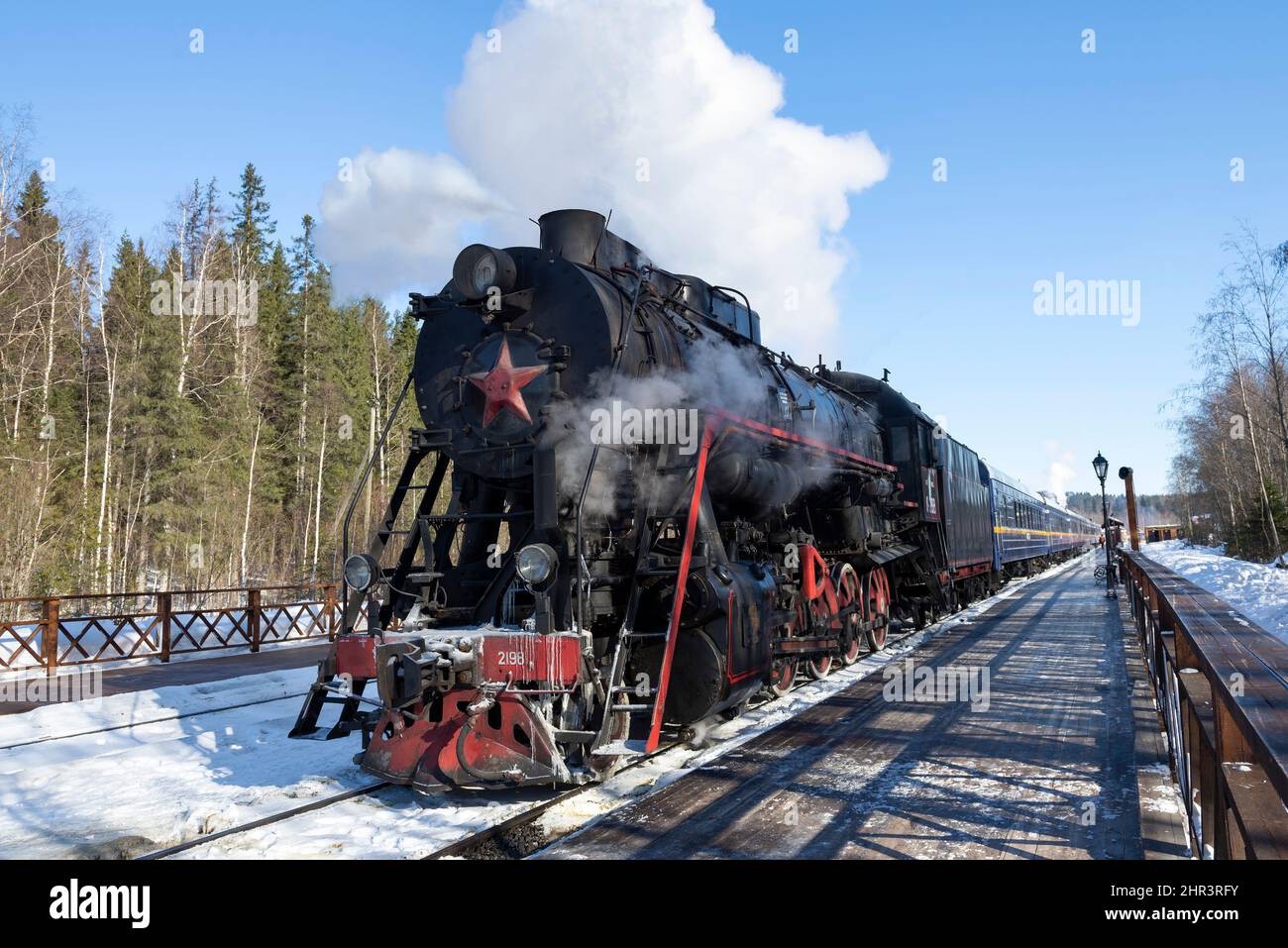 RUSKEALA, RUSSIA - MARCH 10, 2021: Retro train "Ruskeala express" at ...