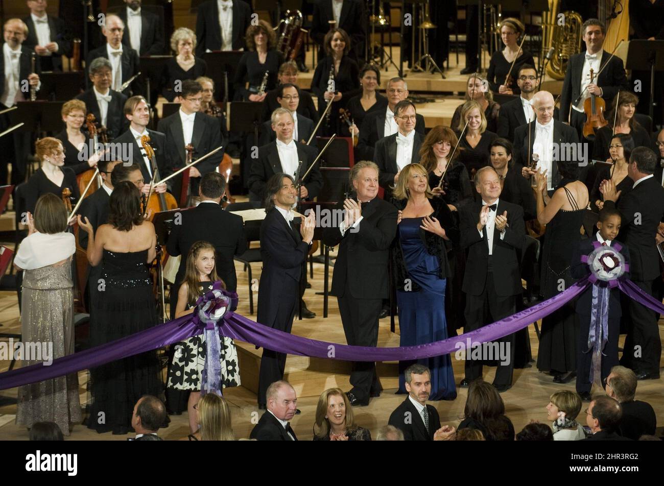 Quebec premier Jean Charest, (front centre) and conductor Kent Nagano ...