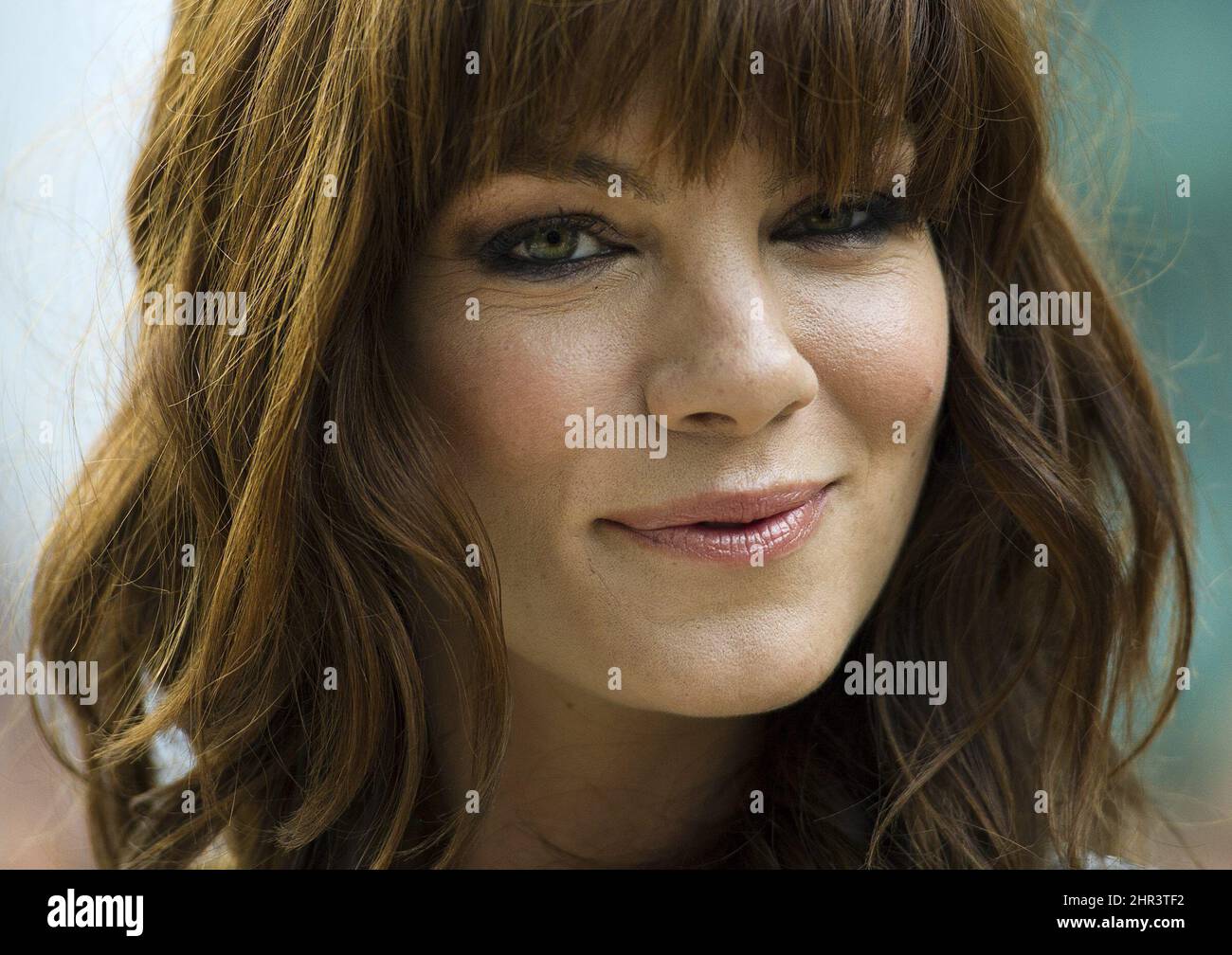 Actress Michelle Monaghan poses for photographs on the red carpet as ...