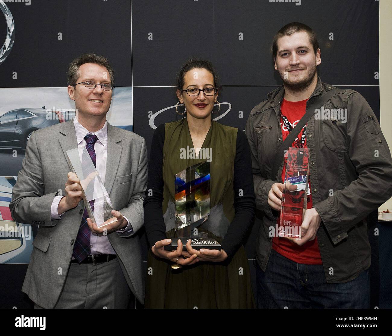 TIFF programmer Thom Powers, left, poses with the Cadillac Peoples ...