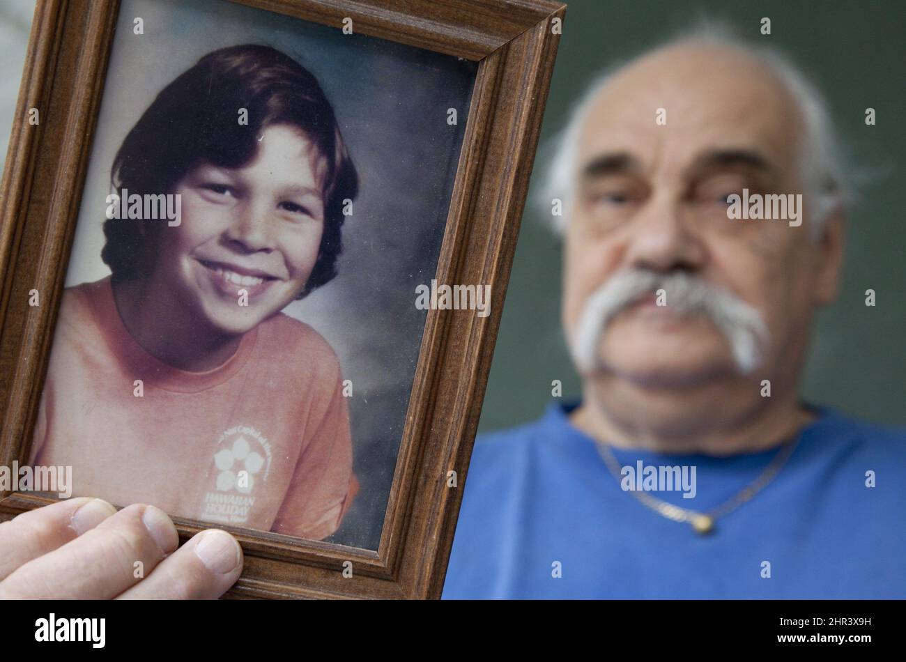 Ray King holds a photo of his son Raymond Jr. in Maple Ridge, B.C ...
