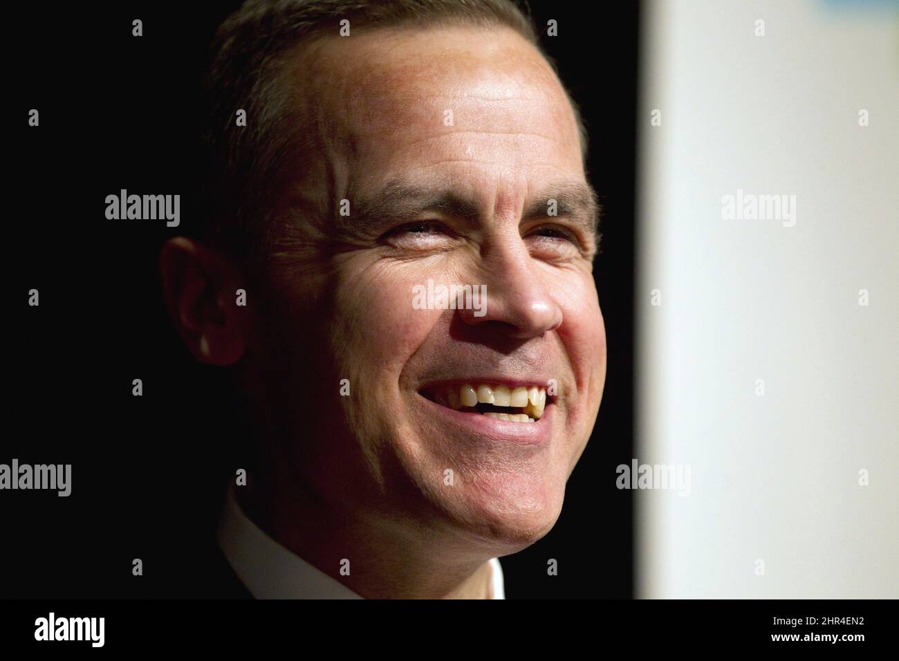 Bank of Canada Governor Mark Carney smiles after speaking to the ...