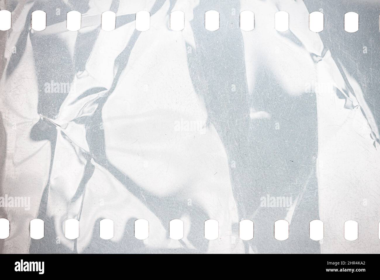 Dusty and grungy 35mm film texture or surface. Perforated scratched ...