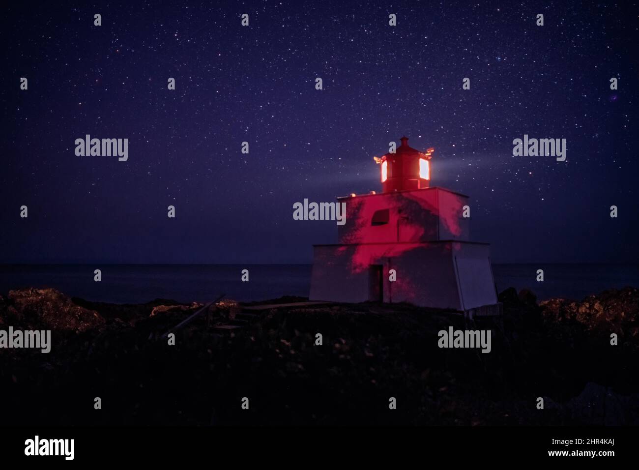Starry night sky at the Amphitrite Point Lighthouse in Ucluelet, Canada ...
