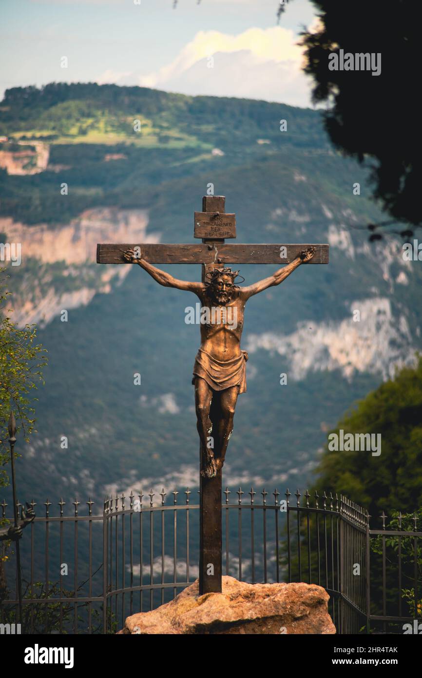 Vertical shot of a bronze statue of Jesus Christ in Ferrara city, Italy Stock Photo - Alamy