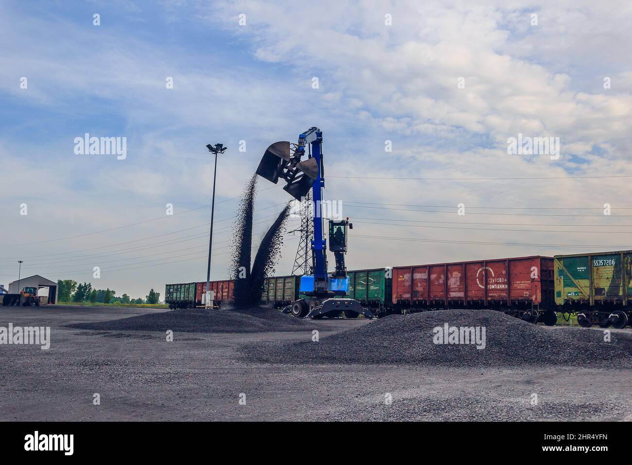 Discharging of the cargo of anthracite from rail wagons at the Klaipeda ...