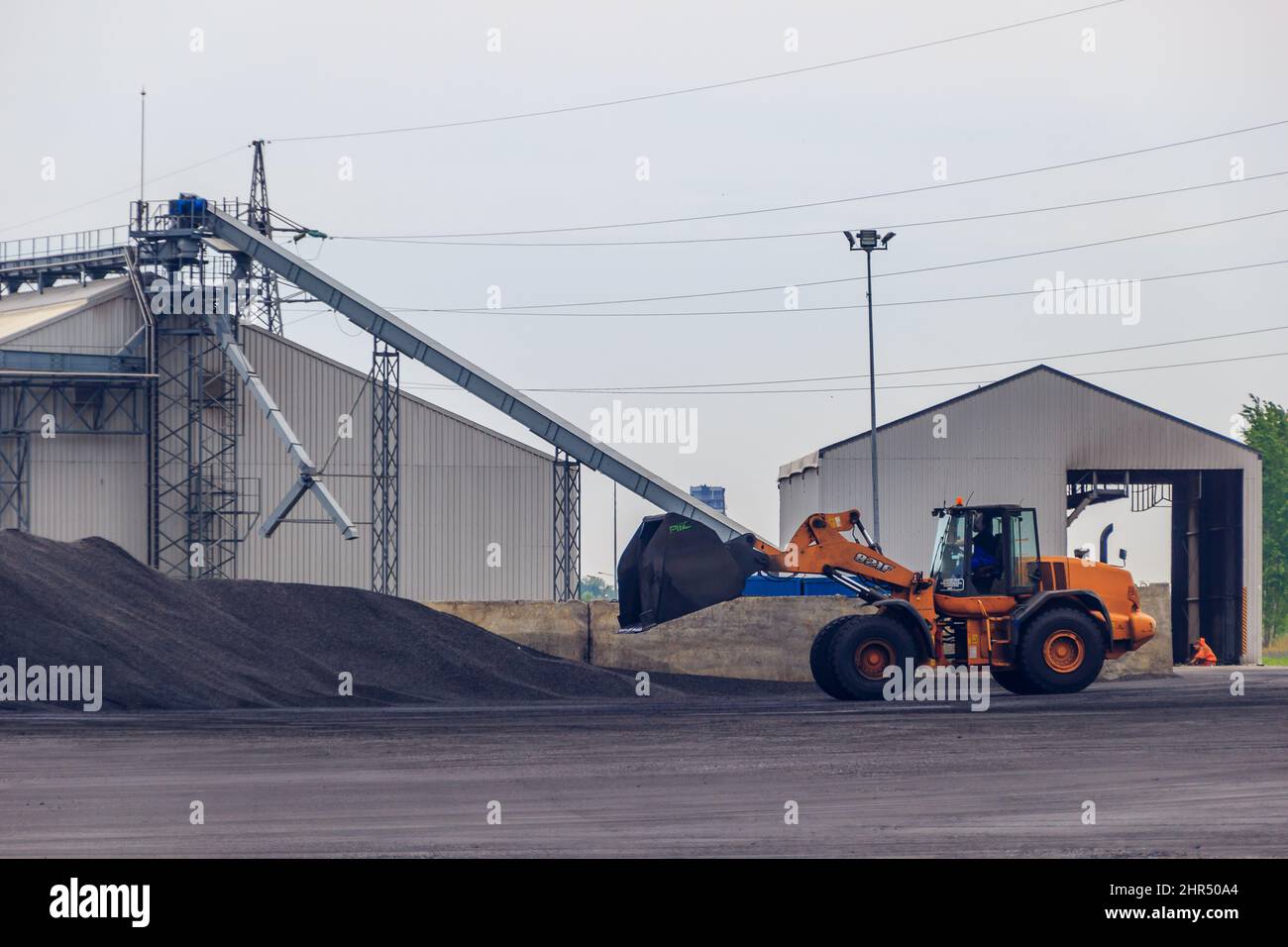 Discharging of the cargo of anthracite from rail wagons at the Klaipeda ...