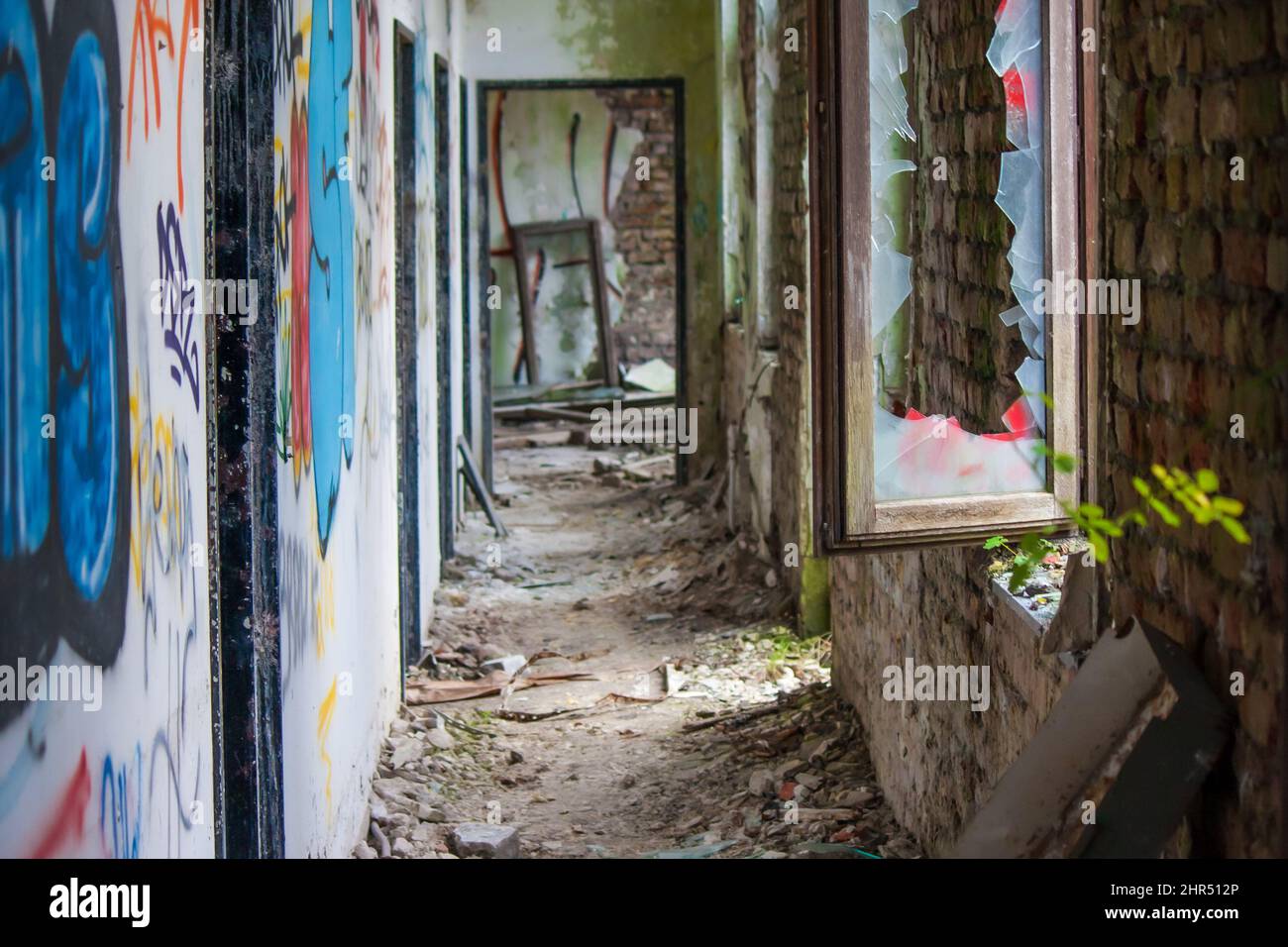 Corridor of an old abandoned building Stock Photo - Alamy
