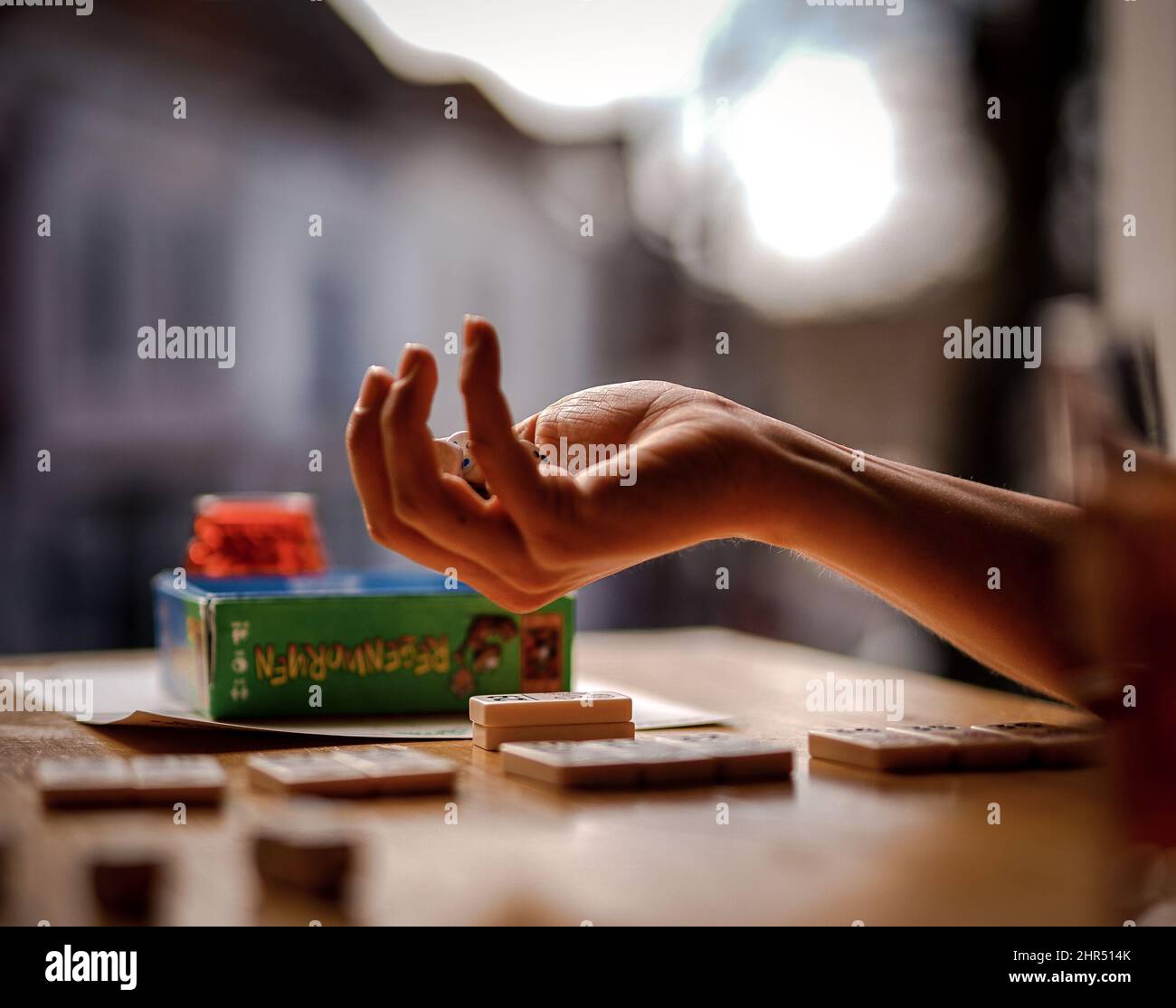 Selective focus shot of a girl playing board game Stock Photo - Alamy