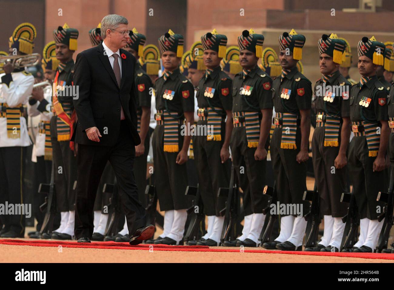 Prime Minister Stephen Harper inspects the Honour Guard as he arrives ...