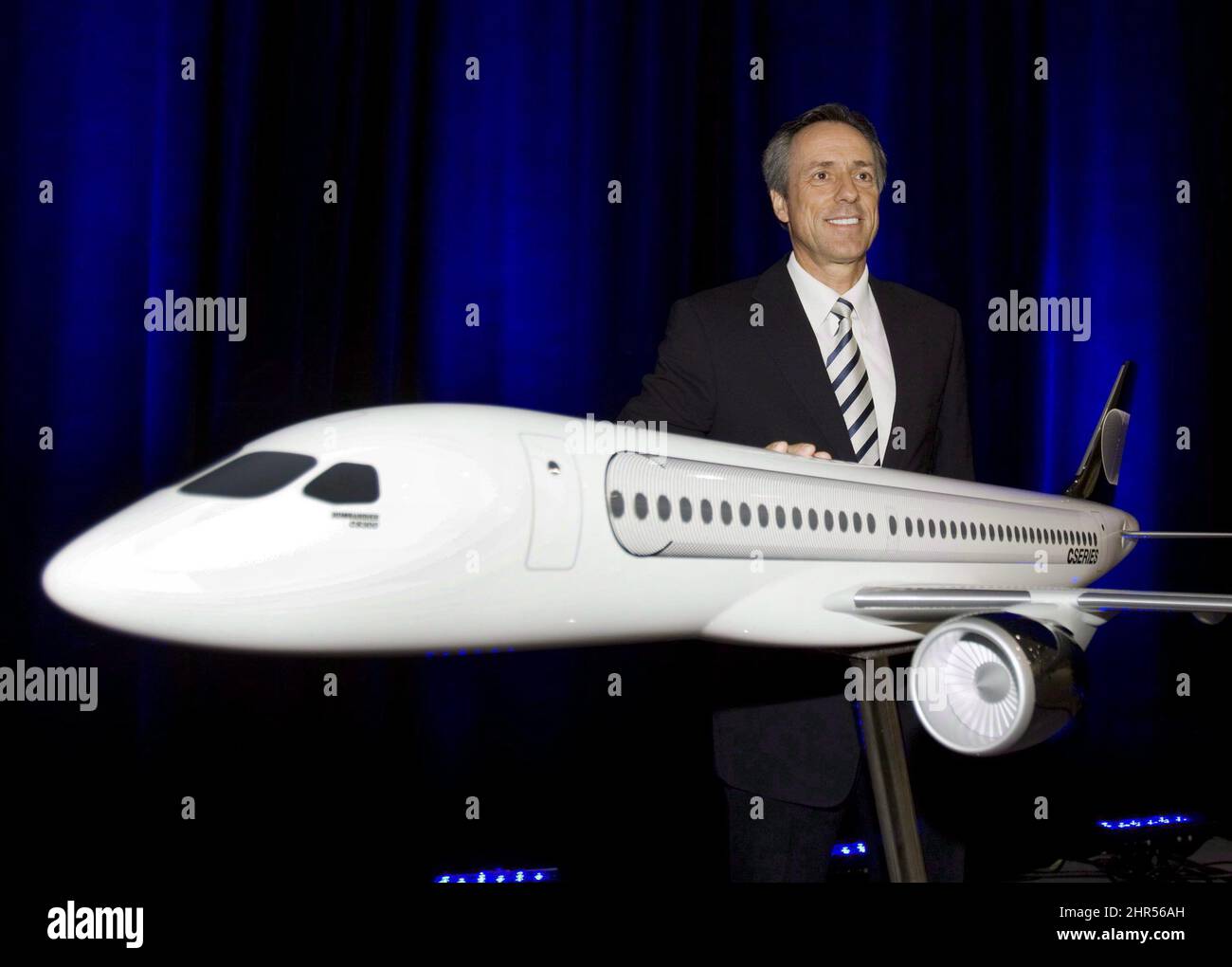 Guy Hachey, president and COO of Bombardier Aerospace poses with a ...