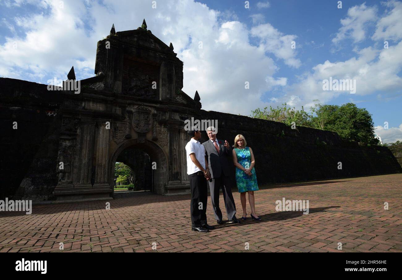 Prime Minister Stephen Harper, middle, and wife Laureen Harper, right ...