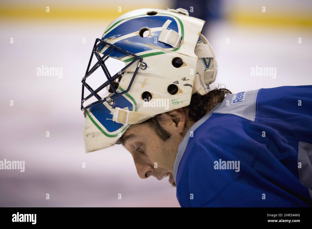 Vancouver Canucks goaltender Roberto Luongo pauses for a moment during ...