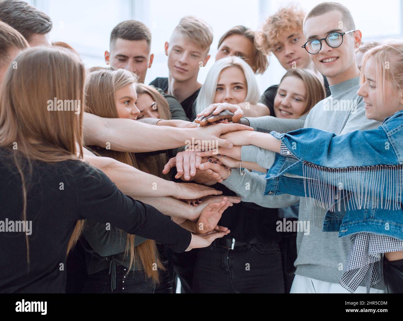 large group of young people showing their unity Stock Photo - Alamy