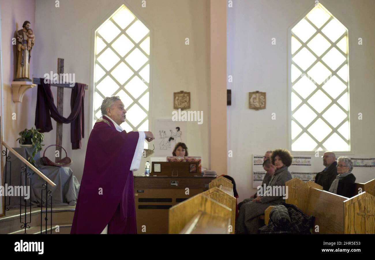 Father Gaston Letendre celebrates mass Sunday, March 3, 2013 in St ...