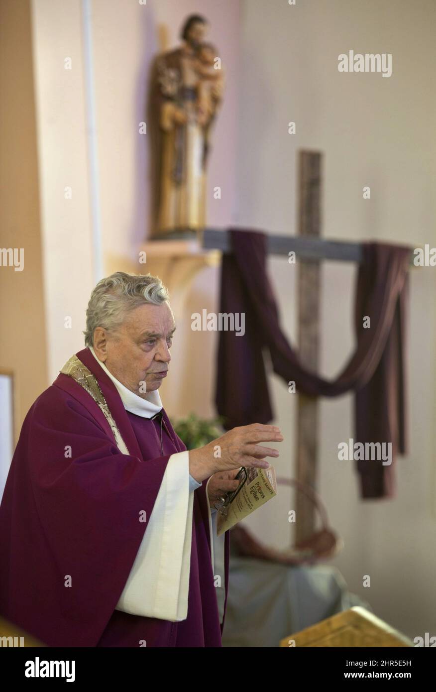 Father Gaston Letendre celebrates mass Sunday, March 3, 2013 in St ...