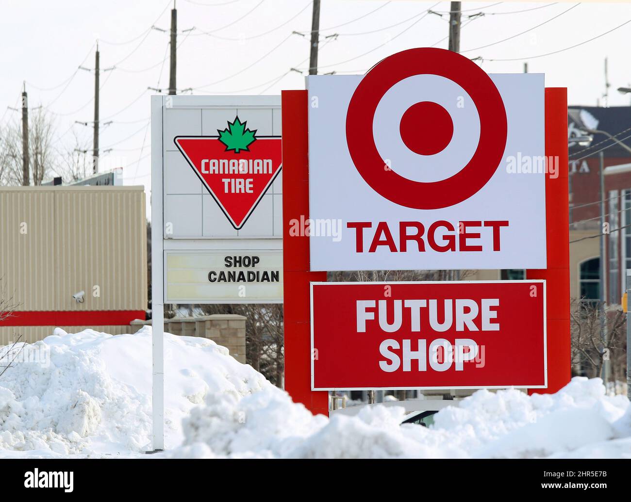 Snow is piled in the parking lot of the new Target store in Guelph ...