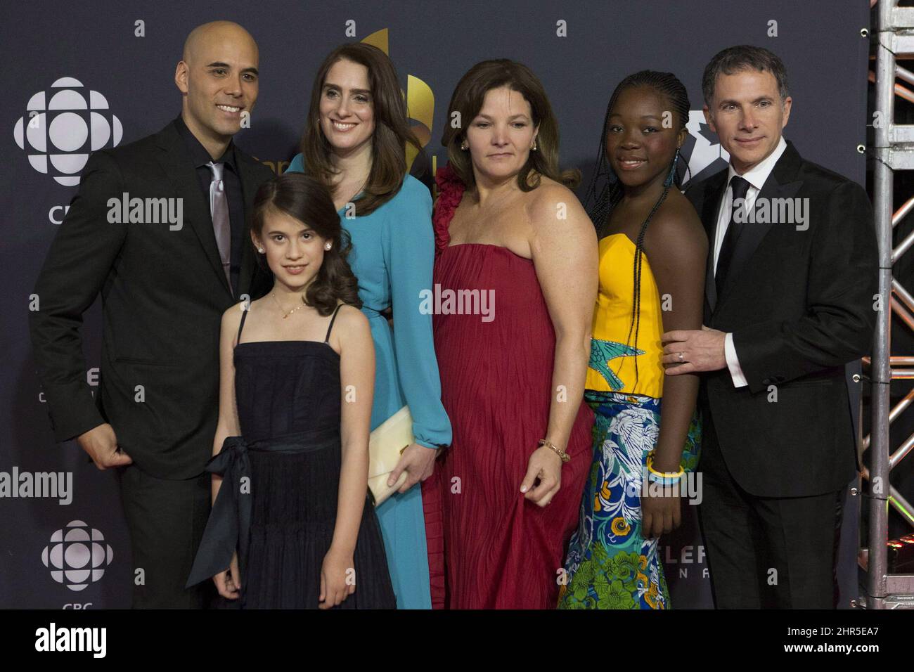 Kim Nguyen, left to right, daughter Elsa Laferrier Nguyen, wife ...