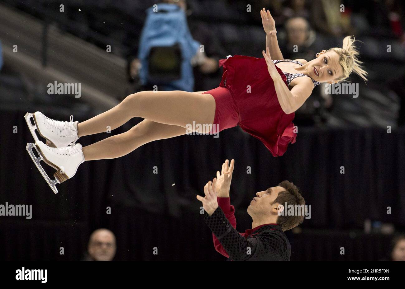Canada's Kirsten Moore-Towers is thrown by her partner Dylan Moscovitch ...