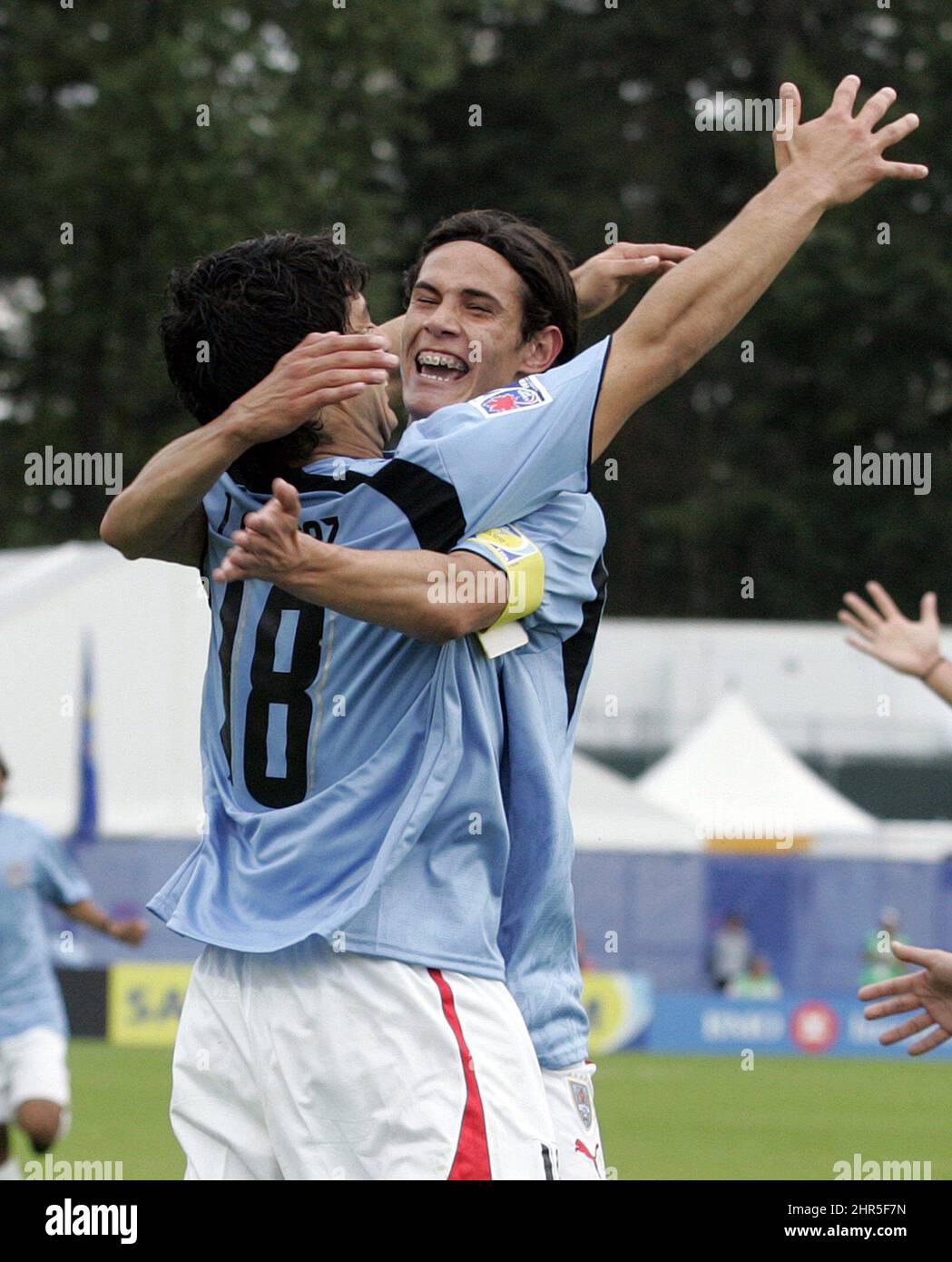 Uruguay's Edinson Cavani (right) congratulates teammate Luis Suarez ...