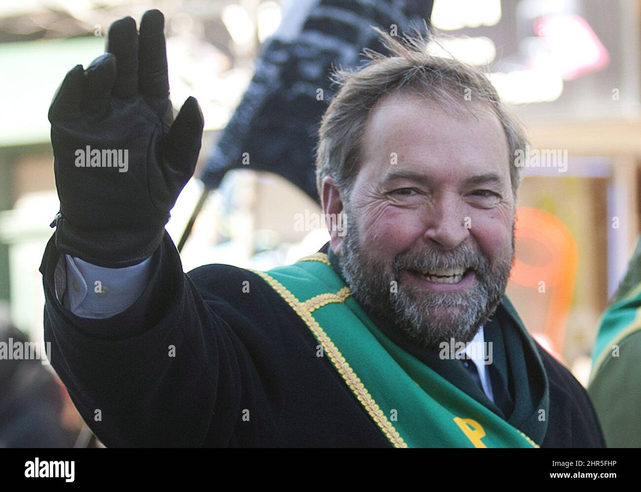NDP leader Thomas Mulcair waves to the crowd during the 190th ...