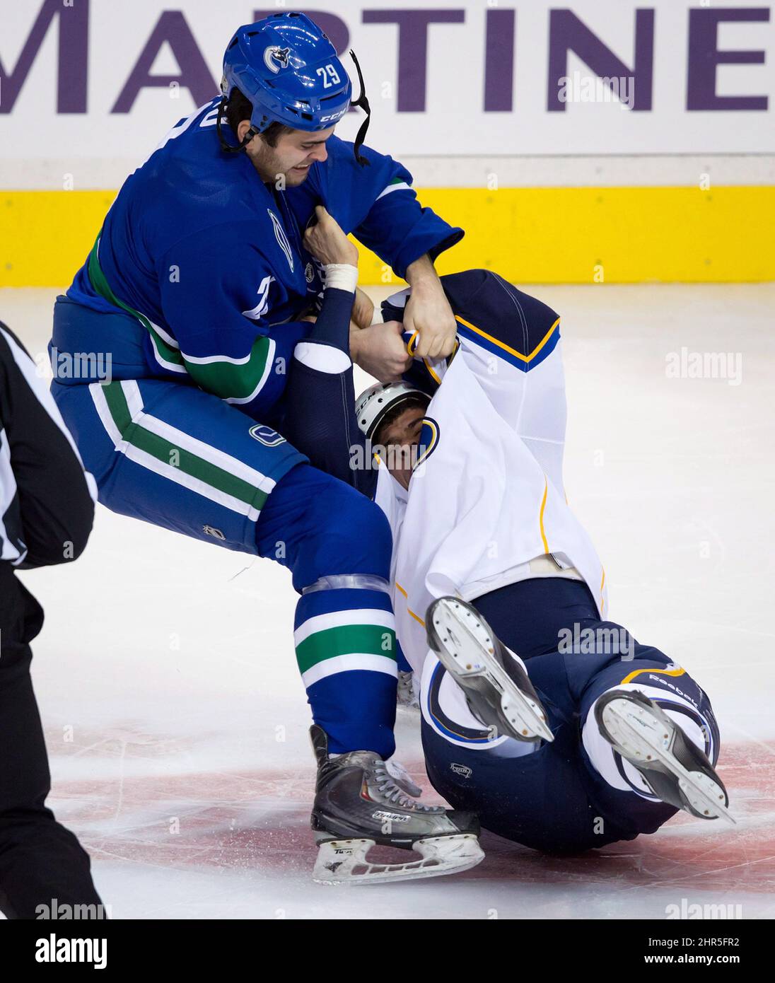 Vancouver Canucks' Tom Sestito, left, and St. Louis Blues' Ryan Reaves ...
