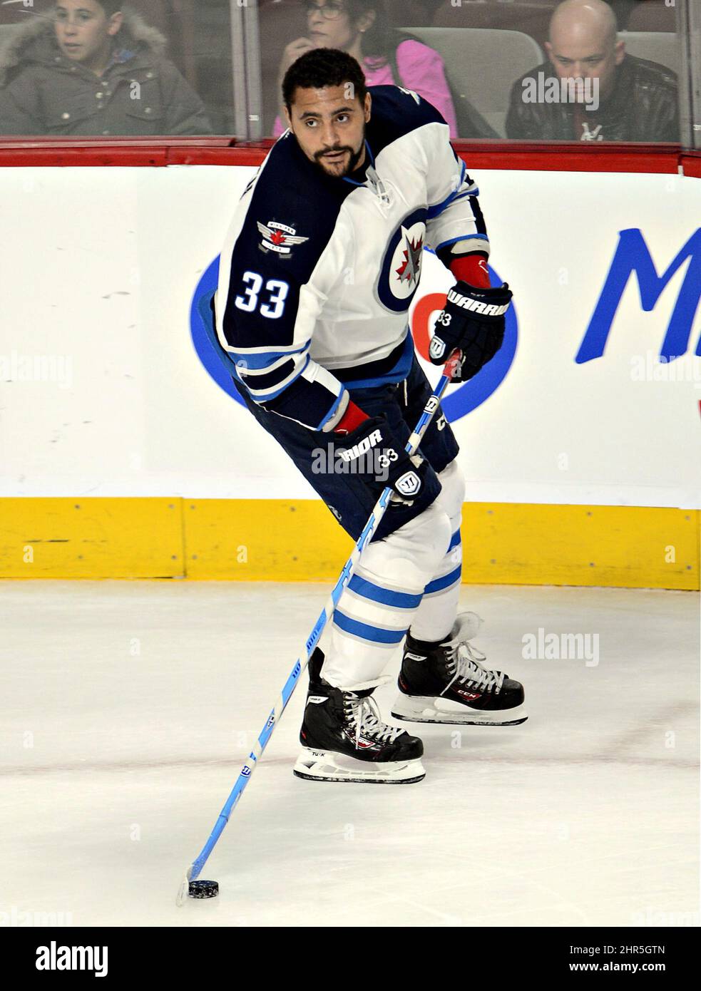 Winnipeg Jets defenseman Dustin Byfuglien (33) warms up before the game ...