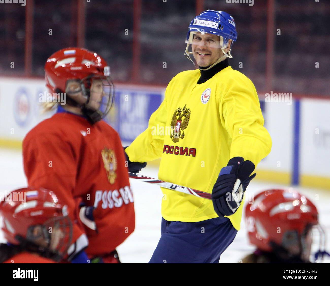 Former NHL hockey player Alexei Yashin (centre) and now general manager ...