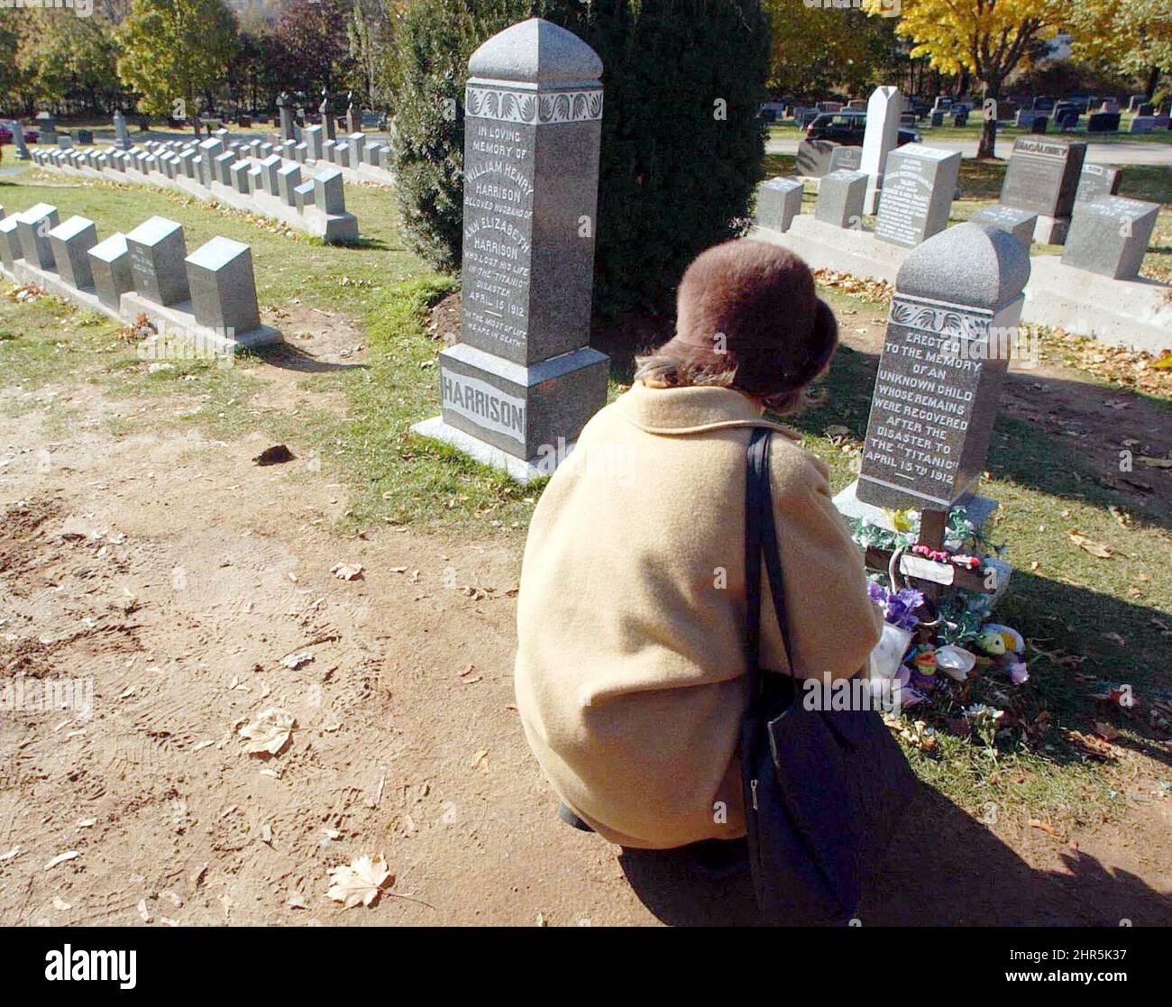 PA PHOTOS/CP - UK USE ONLY: Magda Schleifer looks over the grave of the ...