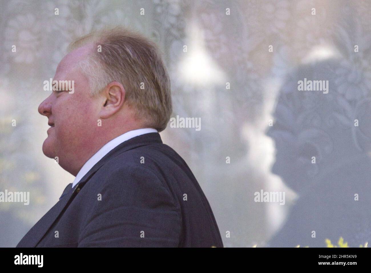 Toronto Mayor Rob Ford leaves his home on Friday May 17, 2013, after ...
