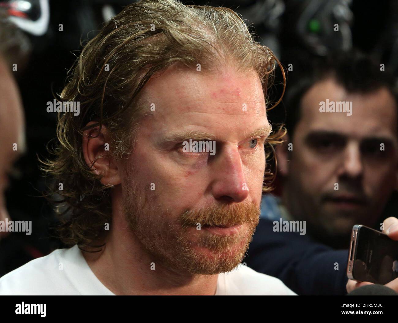 Ottawa Senators team captain Daniel Alfredsson talks to reporters in ...