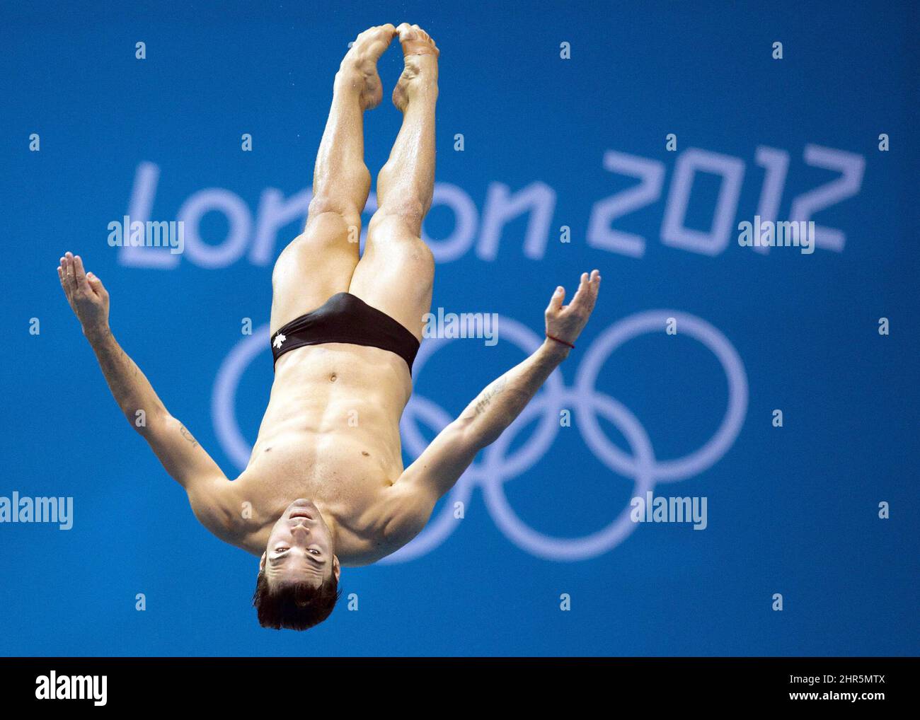 Canadian Olympian diver Alexandre Despatie performs a dive during a ...