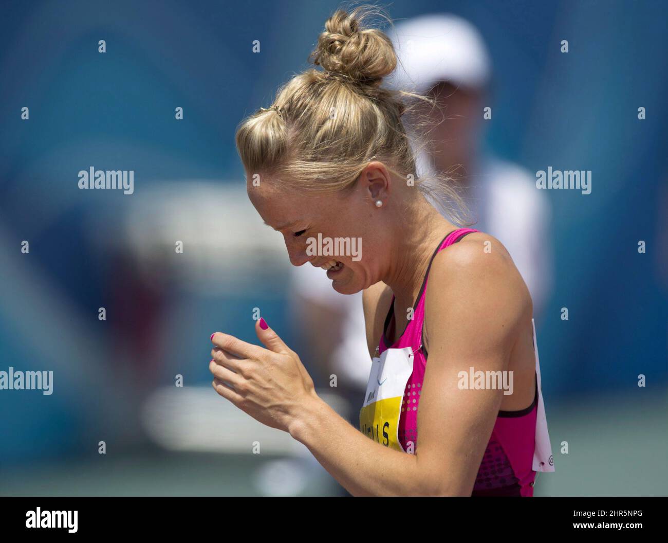 Olympian Sarah Wells from Toronto, reacts after being disqualified in ...