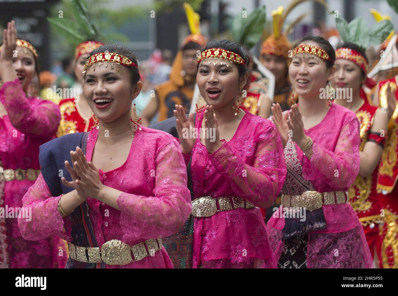 Members of the Indonesian community entertain the crowd as they ...