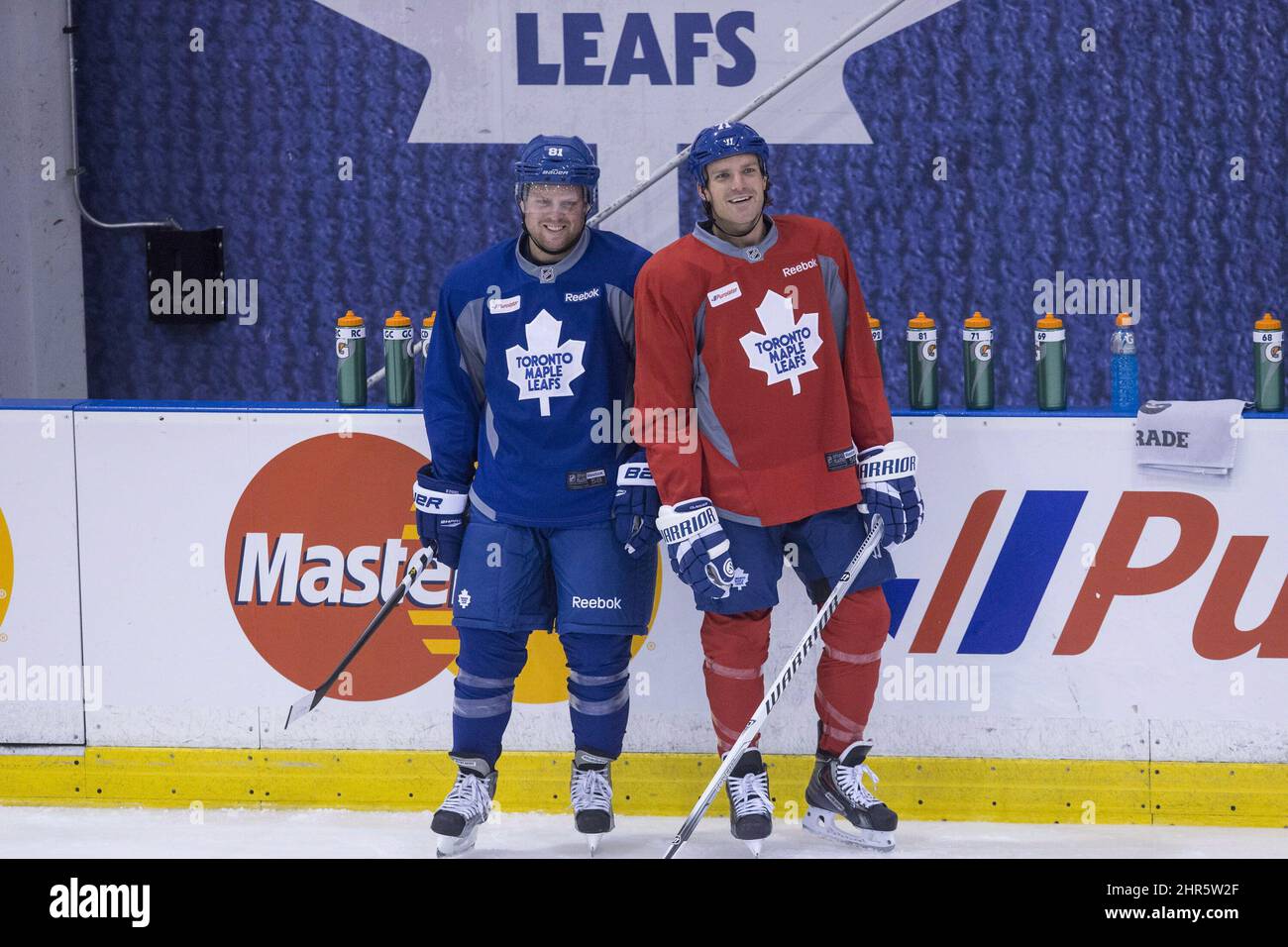 Toronto Maple Leafs Phil Kessel (left) talks to David Clarkson during a ...