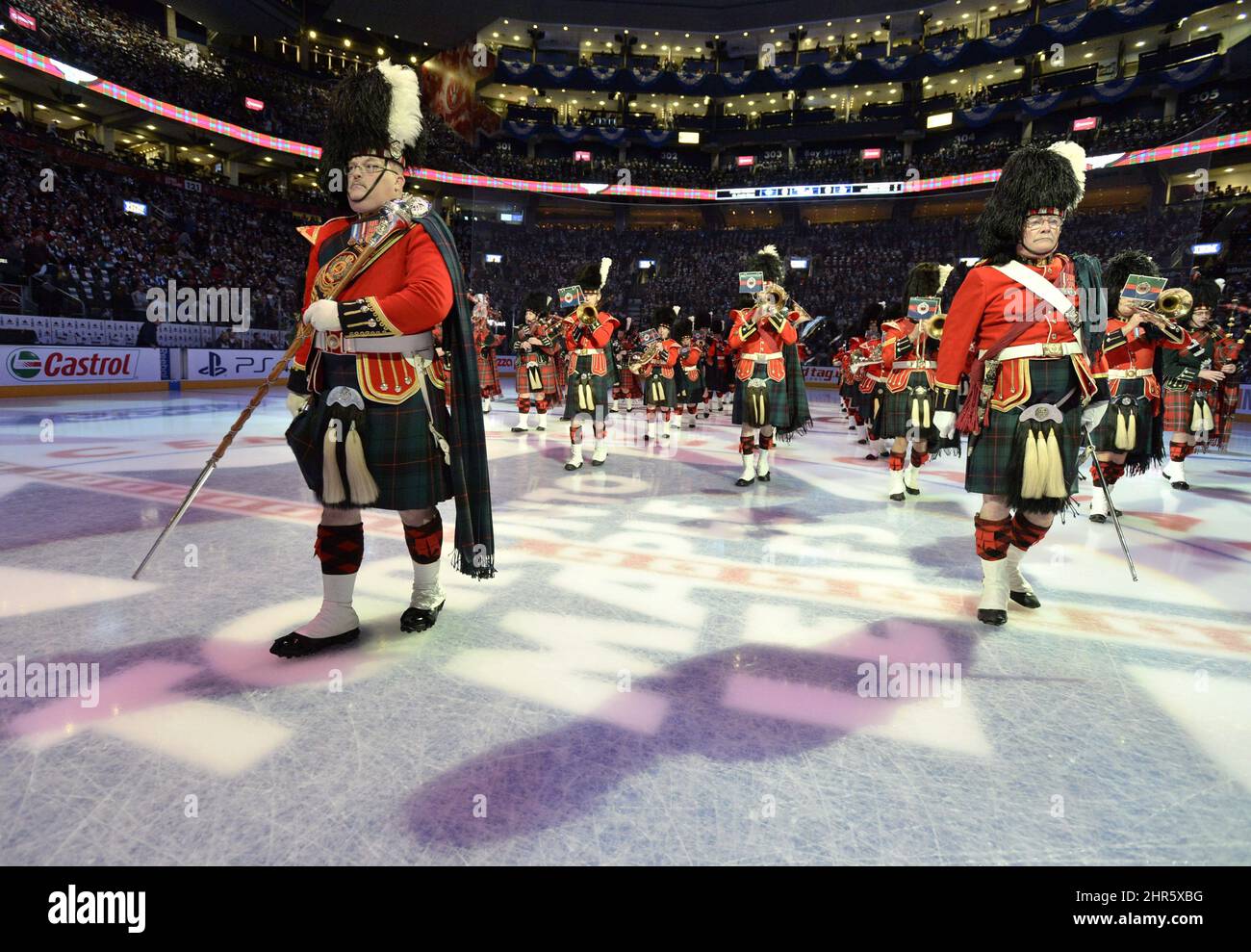 Members of the 48th Highlanders Pipe and Drum Band perform before the ...