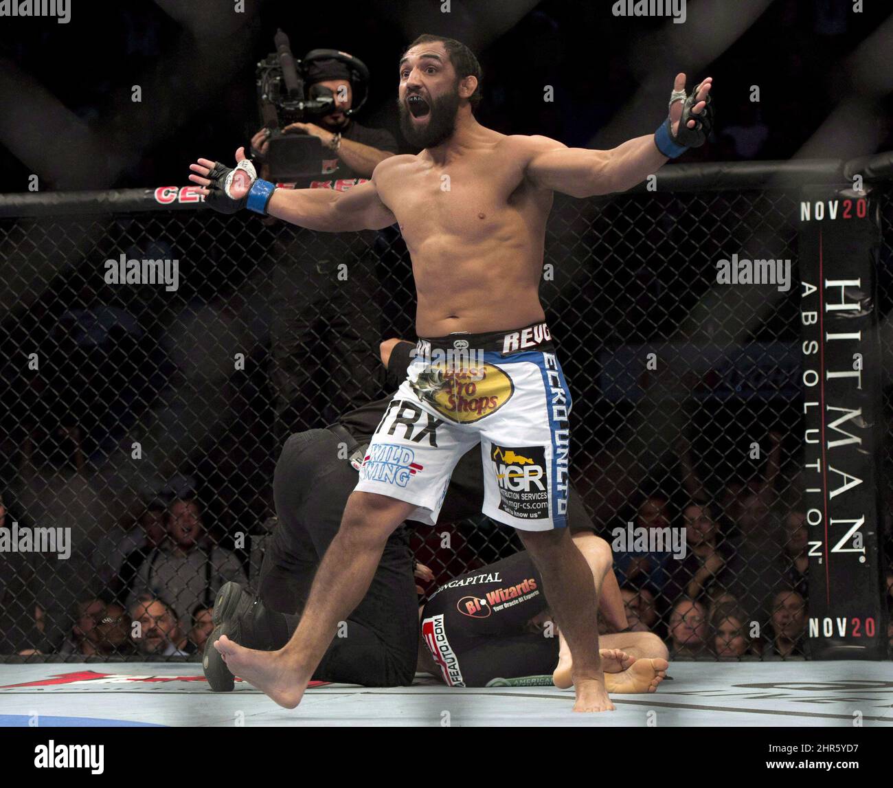 Johnny (Big Rigg) Hendricks, from Dallas, reacts after knocking out ...