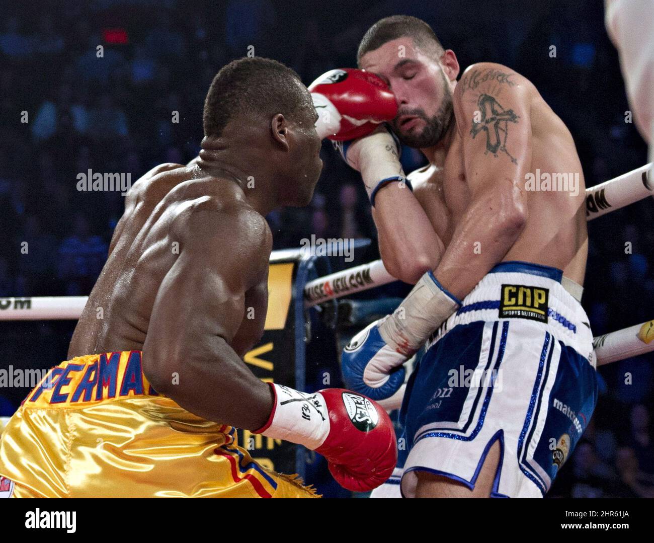 Adonis Stevenson, of Montreal, left, lands a left hand to the the face ...