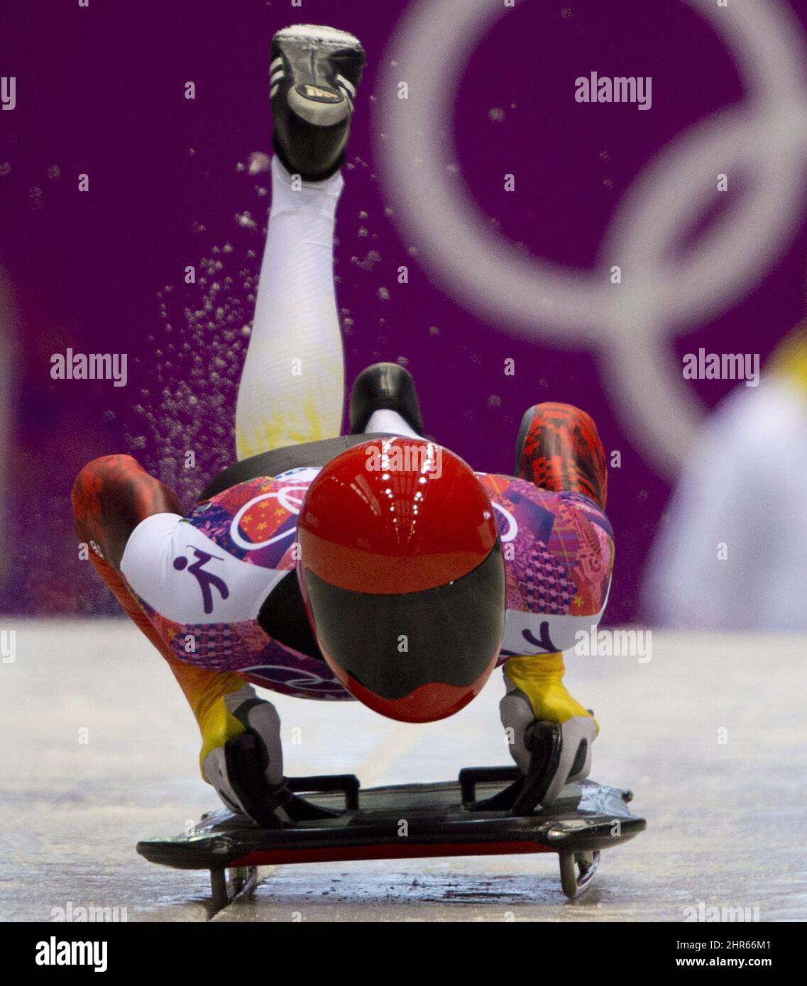 Frank Rommel of Germany prepares to jump on his sled during Heat 1 of ...