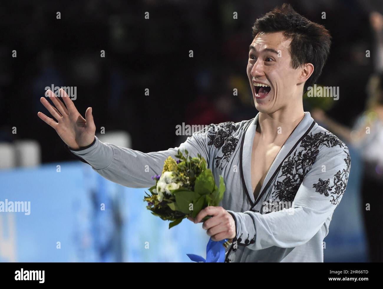 Men's silver medalist Canada's Patrick Chan reacts to the crowd during ...