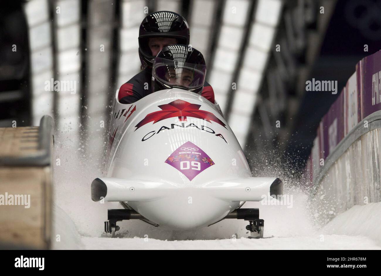 Canada 2 pilot Chris Spring and Jesse Lumsden cross the finish line ...