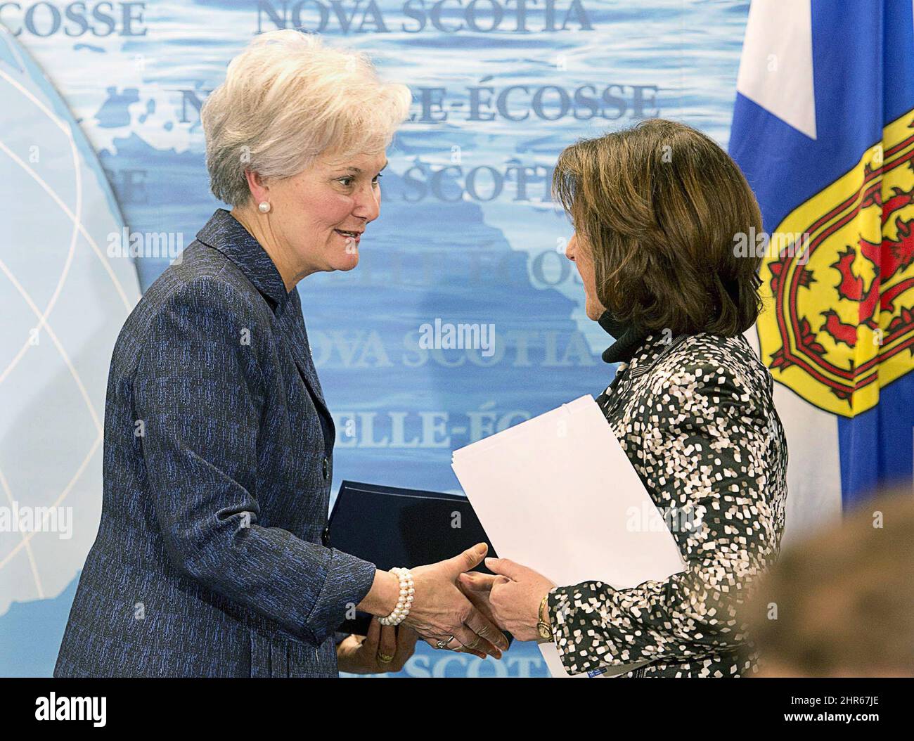 Education Minister Karen Casey, left, chats with Myra Freeman after a ...