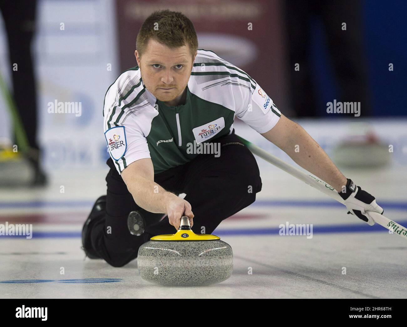 Prince Edward Island's Tyler MacKenzie tests rocks during a practice ...