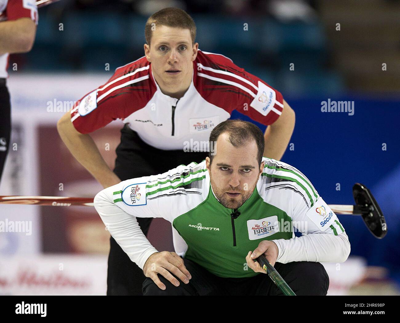 Newfoundland and Labrador's Adam Casey looks over Saskatchewan skip ...