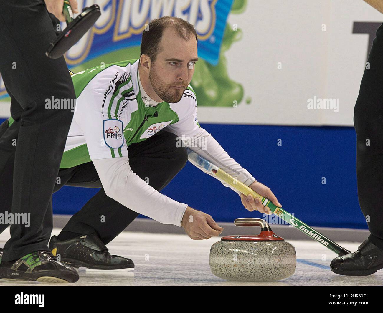 Saskatchewan skip Steve Laycock releases a rock as they play Manitoba ...