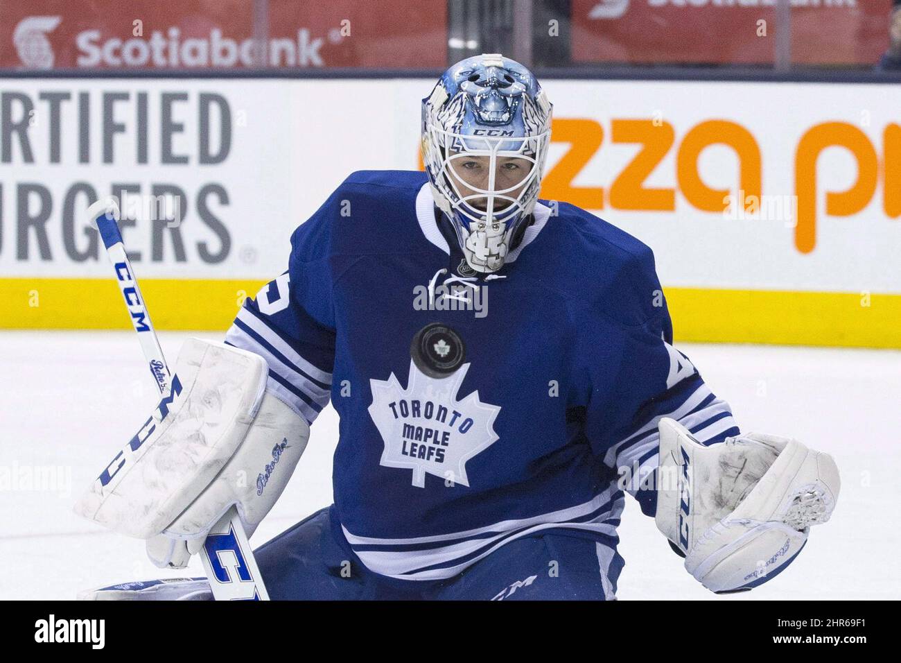 Toronto Maple Leafs goaltender Jonathan Bernier makes a save against ...