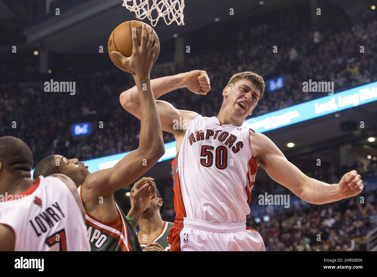 Toronto Raptors' Tyler Hansbrough (right) celebrates scoring on a ...