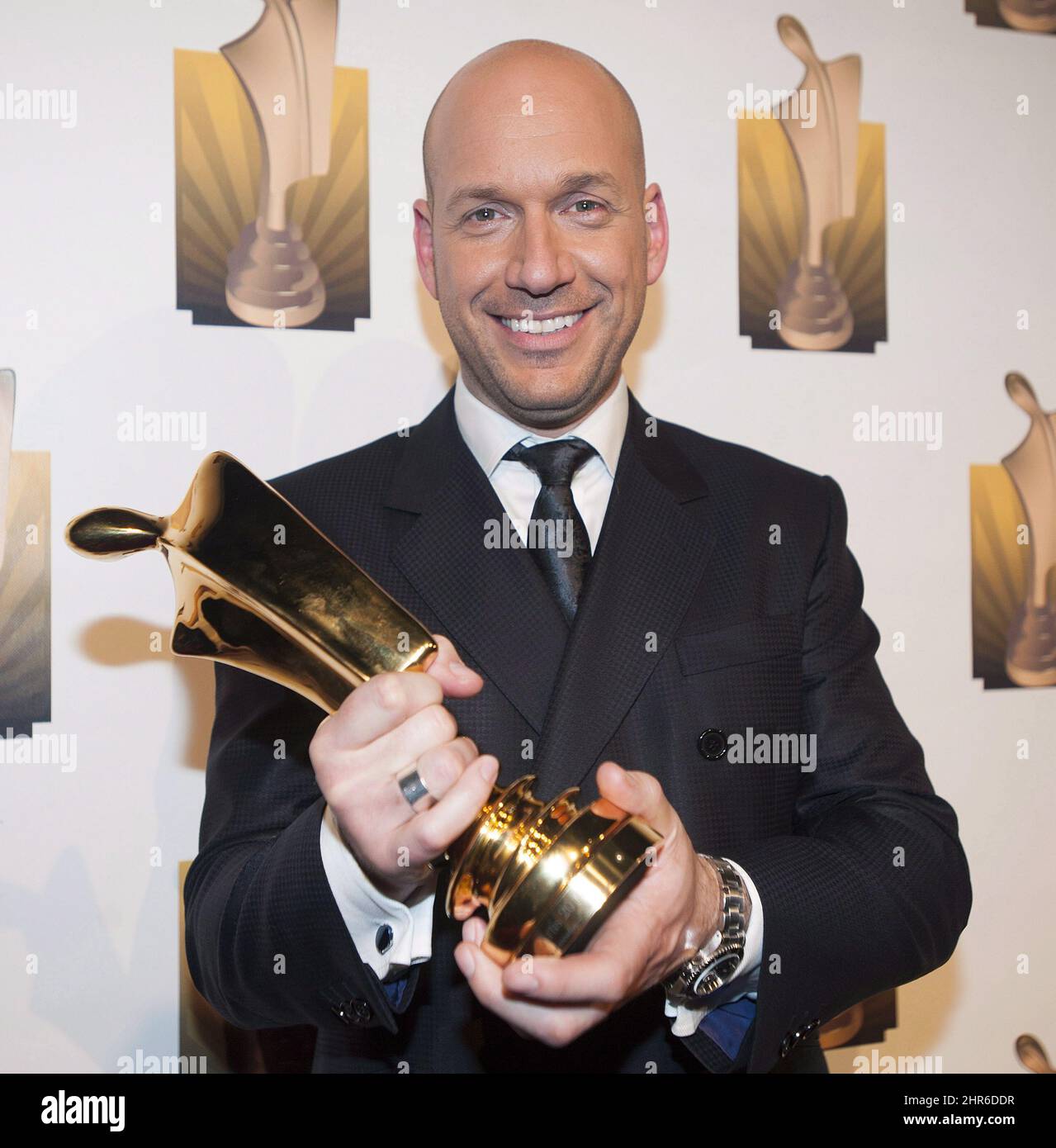 Martin Matte holds his trophy for best actor in a comedy series at the ...