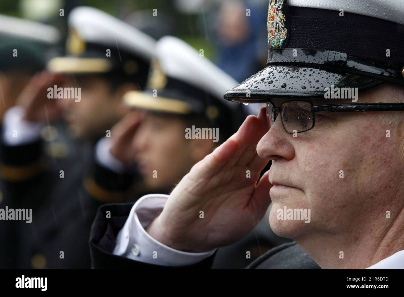 Chief Petty Officer Shawn Taylor salutes as Canadian Armed Forces ...